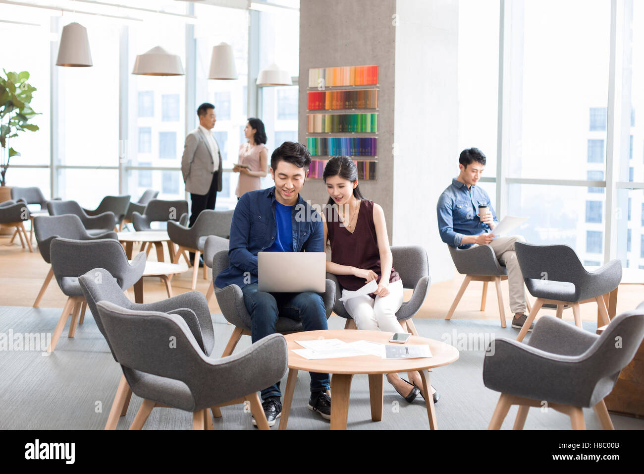 Chinese business people working in office Stock Photo - Alamy