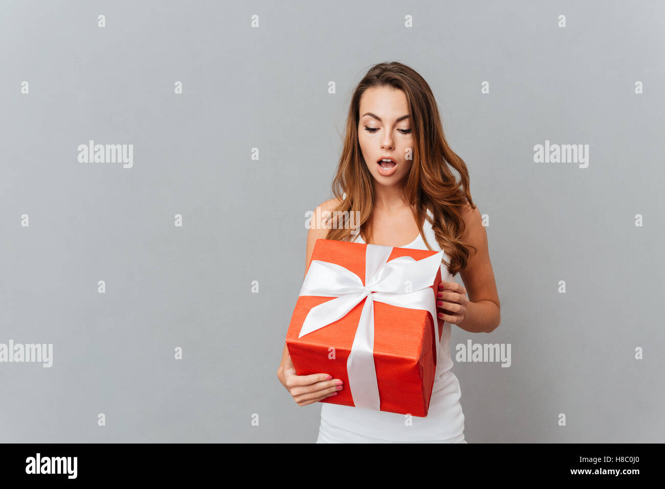 Woman open present hi-res stock photography and images - Alamy
