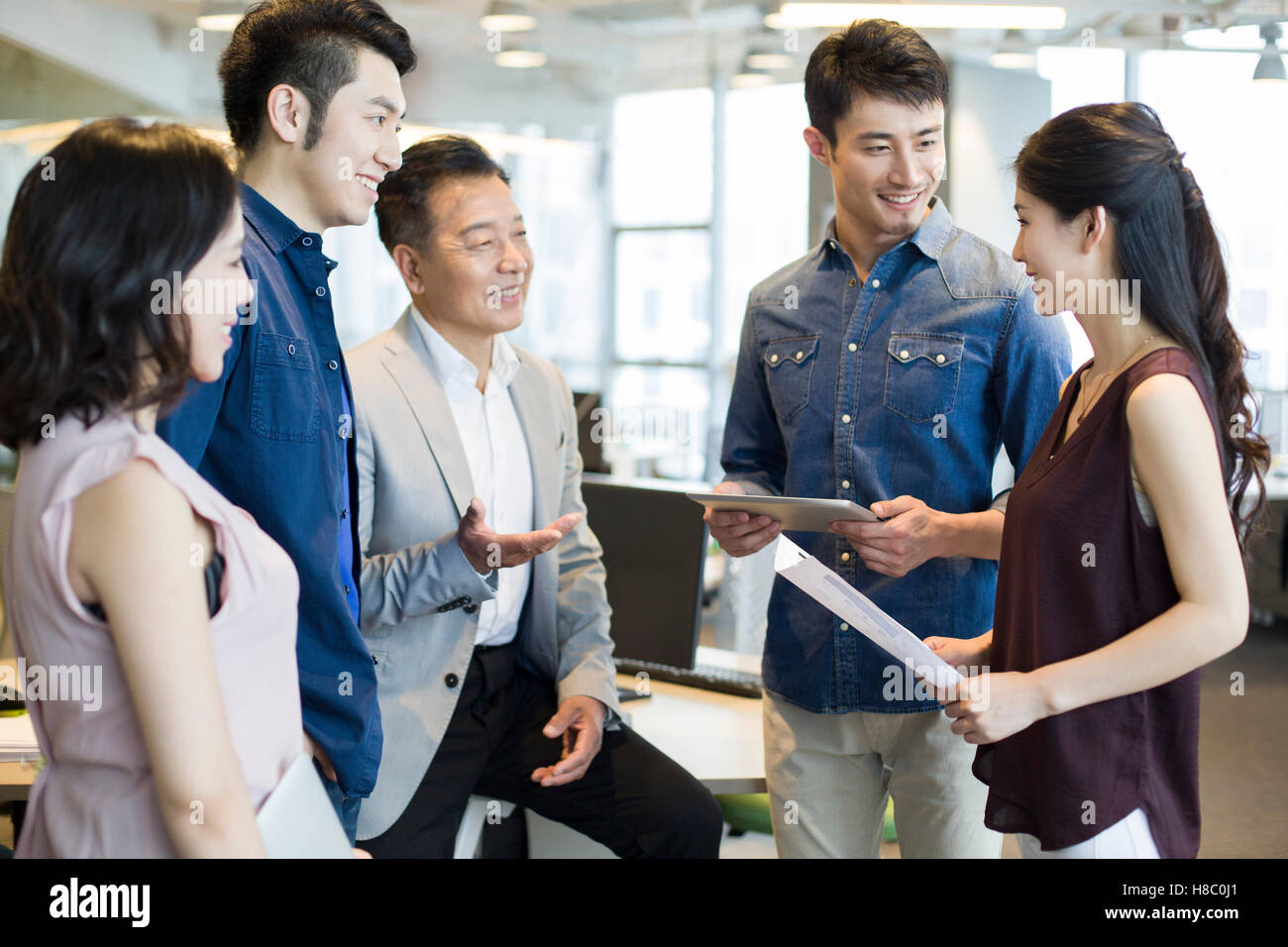 Chinese business people talking in meeting Stock Photo - Alamy