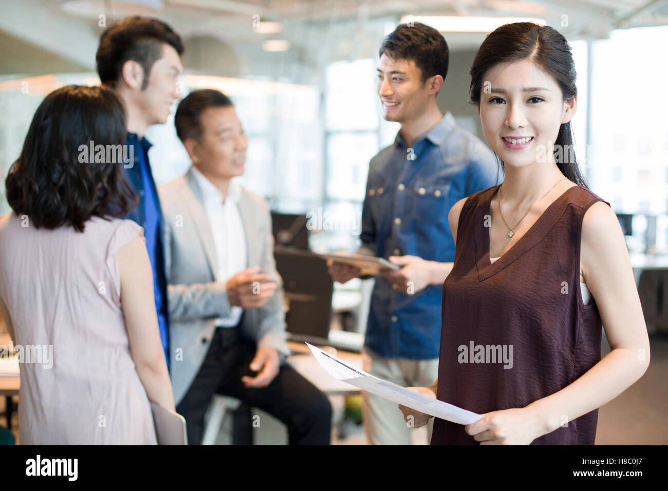 Chinese business people talking in meeting Stock Photo - Alamy