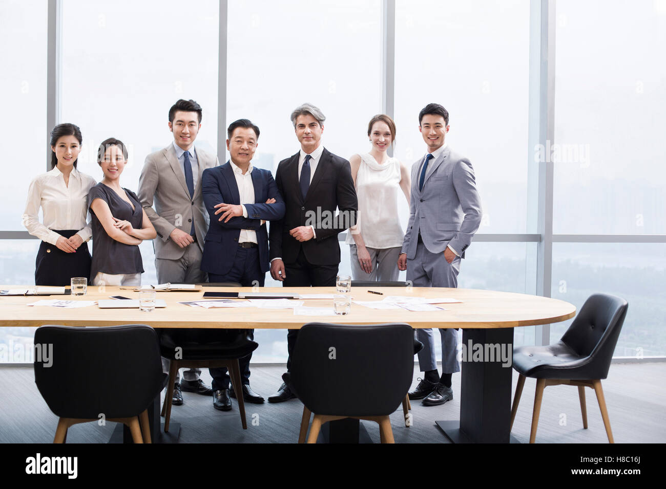 Portrait of Chinese business people in meeting room Stock Photo - Alamy