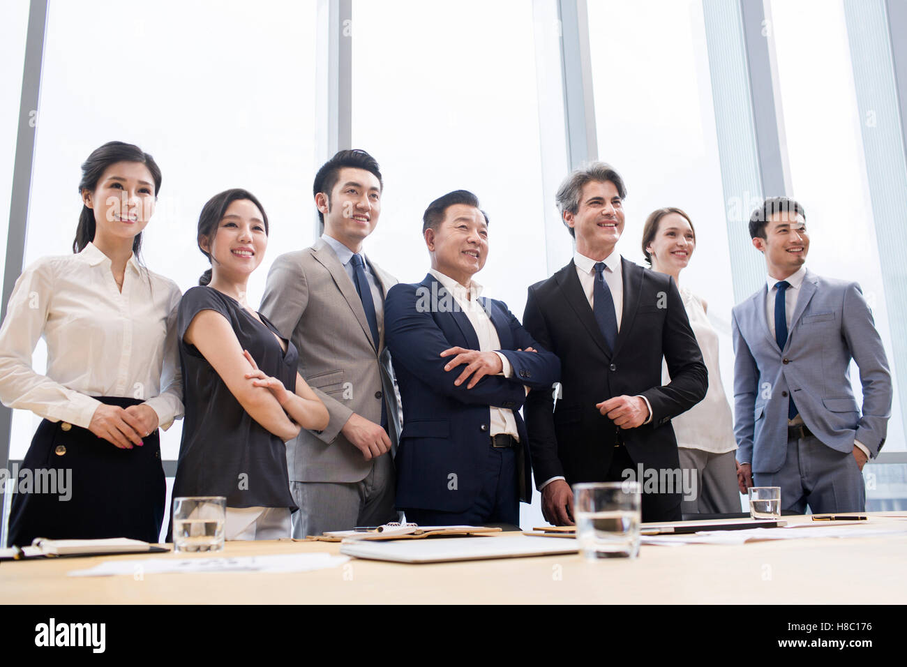 Confident Chinese business people in meeting room Stock Photo - Alamy