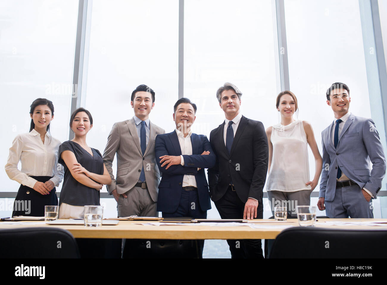 Confident Chinese business people in meeting room Stock Photo - Alamy