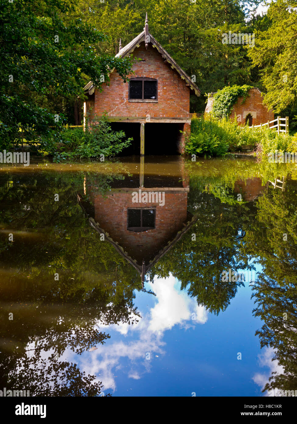 Boat house and pond in the grounds of Elvaston Country Park near Derby ...