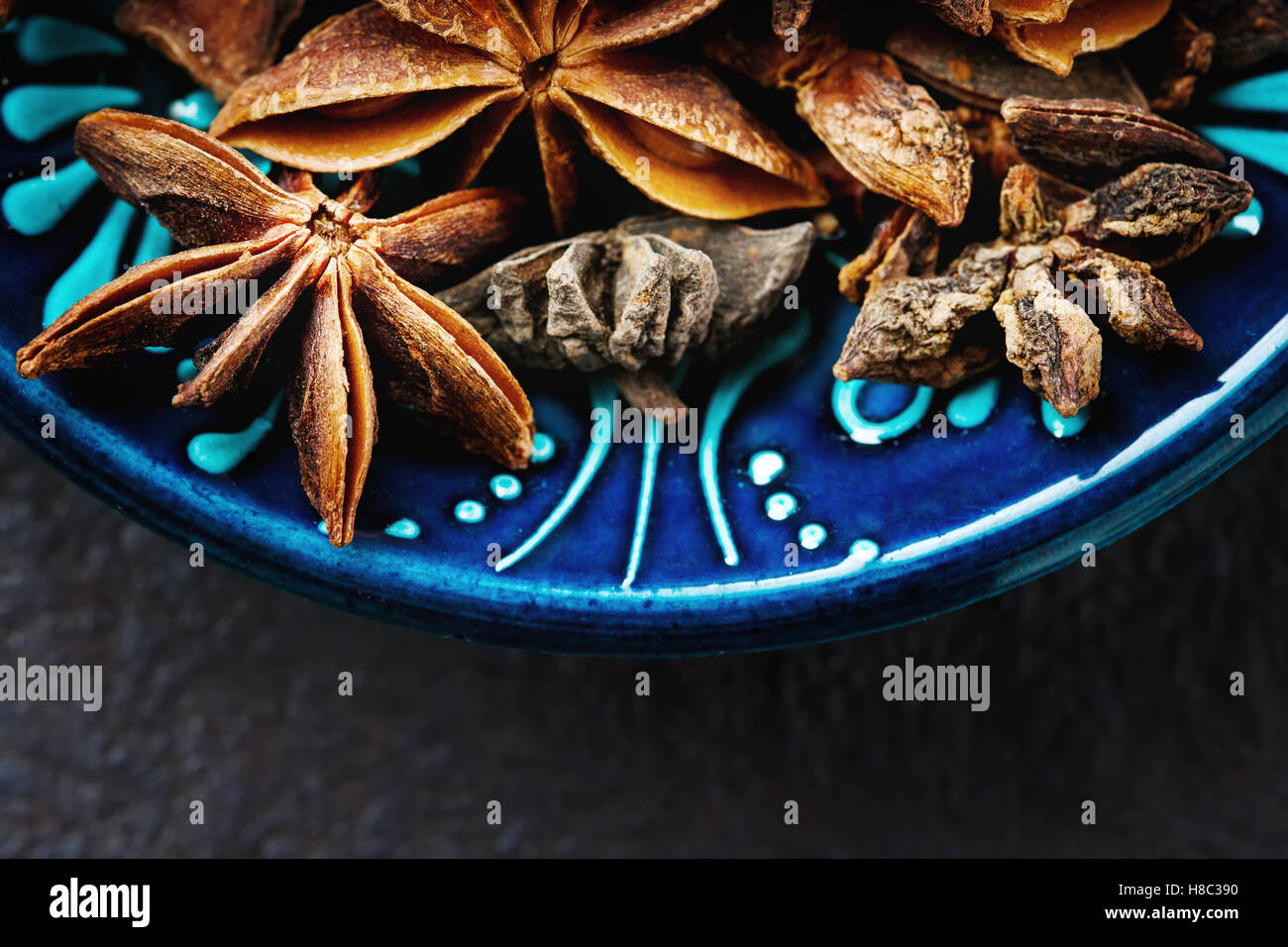 Anise star spice extreme close-up, top view Stock Photo - Alamy