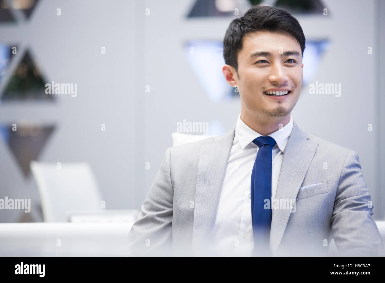Confident Chinese businessman Stock Photo - Alamy