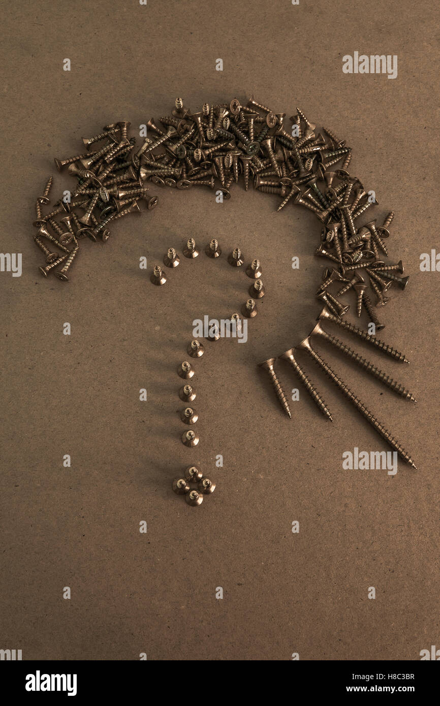 Pile and Line of Screws in shape of Question Mark Stock Photo - Alamy