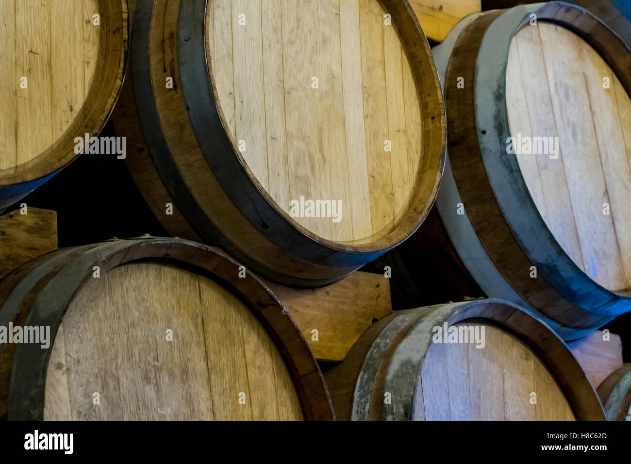 Close up view at lot of barrels in storage Stock Photo - Alamy