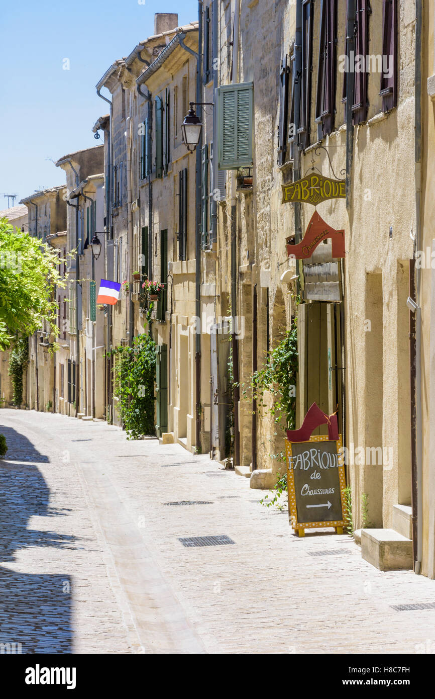 Sand coloured buildings along an old street within the medieval town of ...