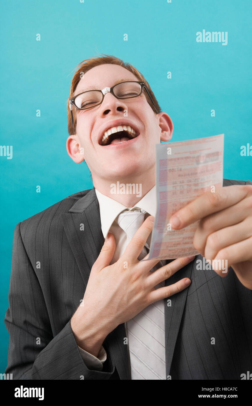 man celebrating his lottery win Stock Photo - Alamy