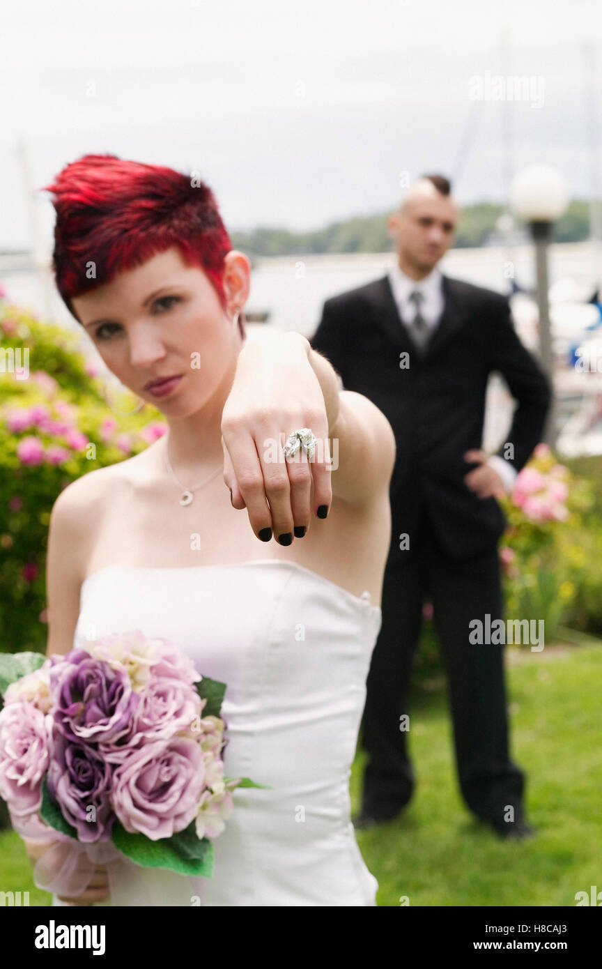 Woman taking off wedding ring hi-res stock photography and images - Alamy
