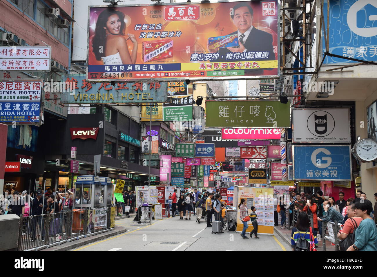 Hong Kong, China - Street signs and advertisement in the busy streets ...