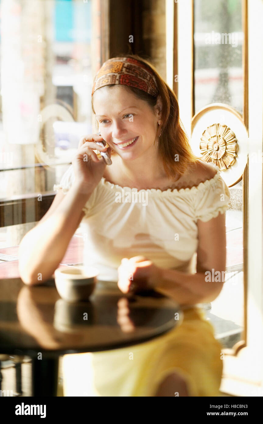 woman relaxing in cafe Stock Photo - Alamy