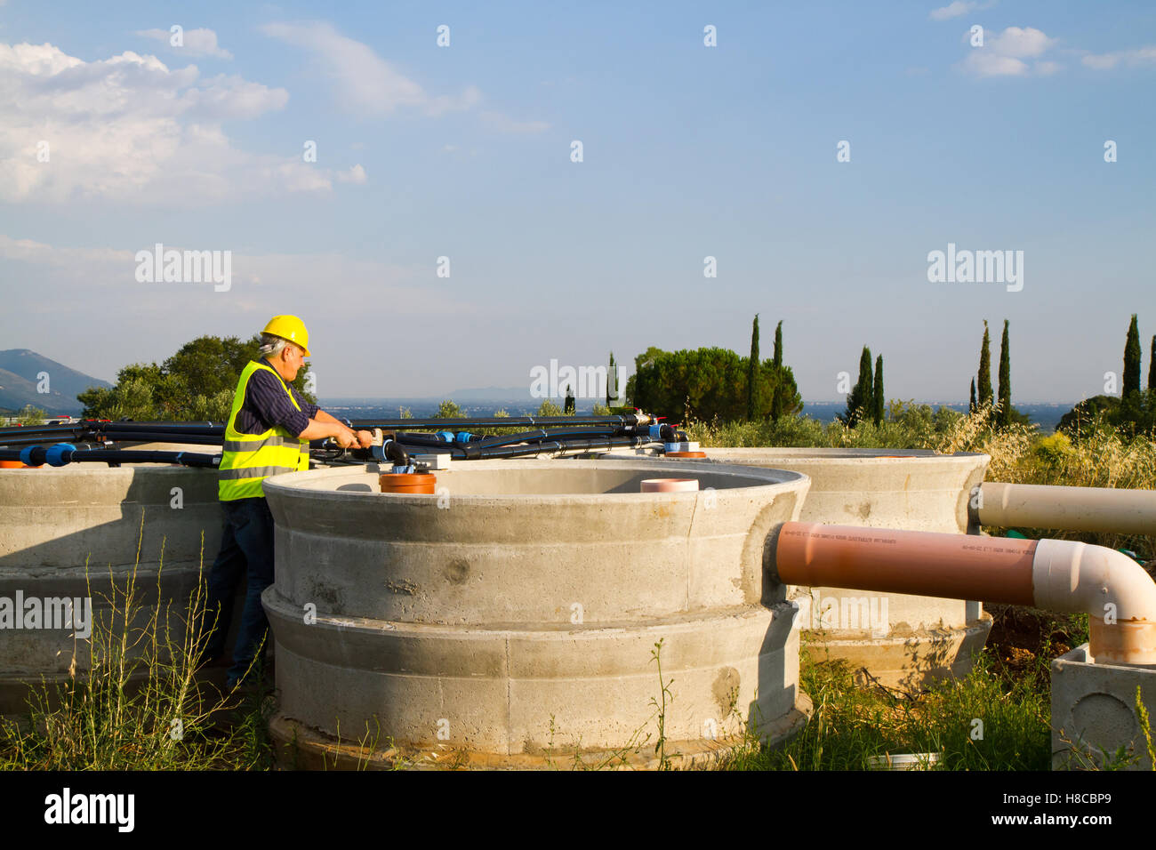 plumber at work in a building site Stock Photo - Alamy