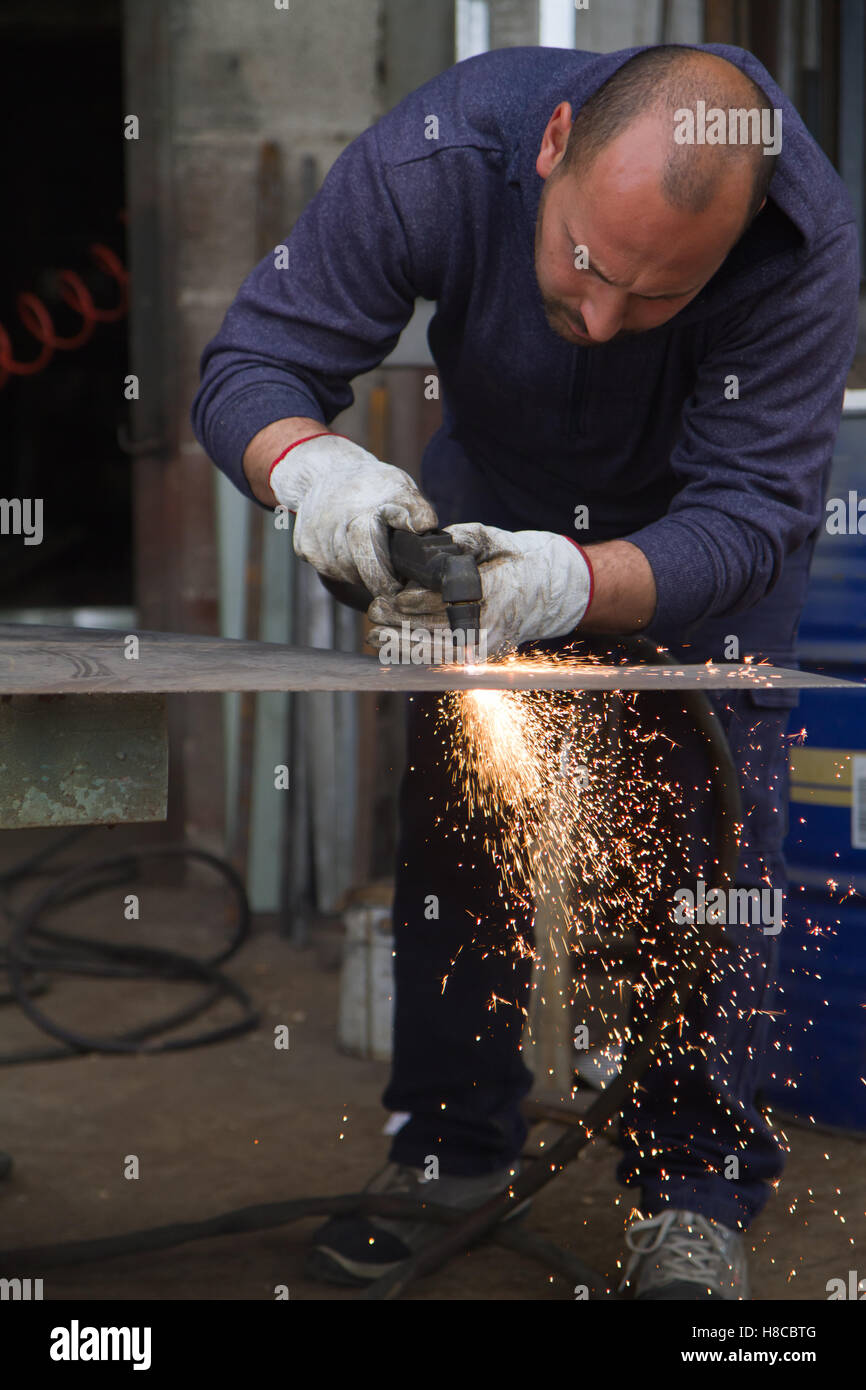 metalworker in his workshop Stock Photo - Alamy