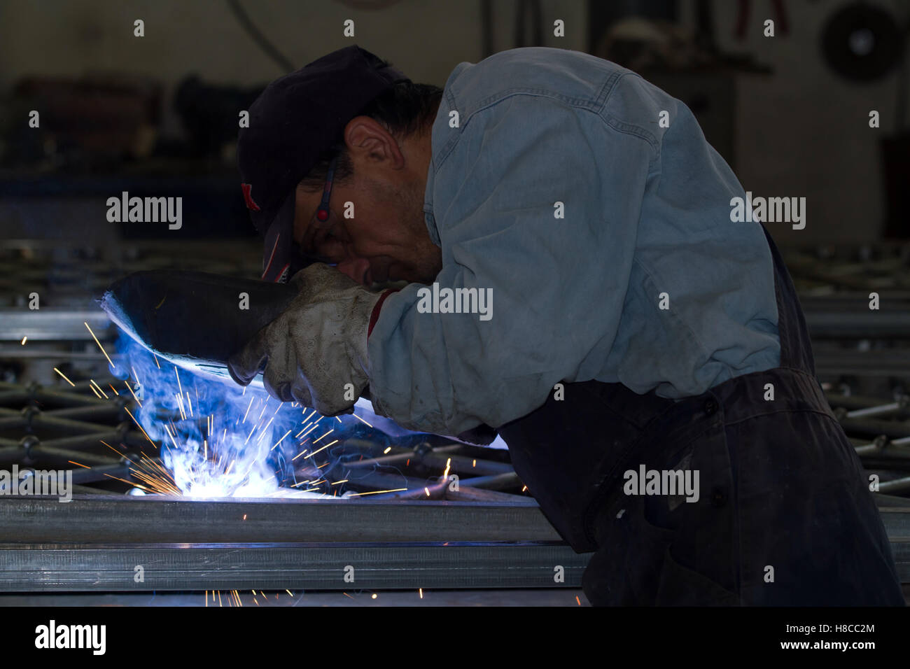 metalworker at work in a workshop Stock Photo - Alamy