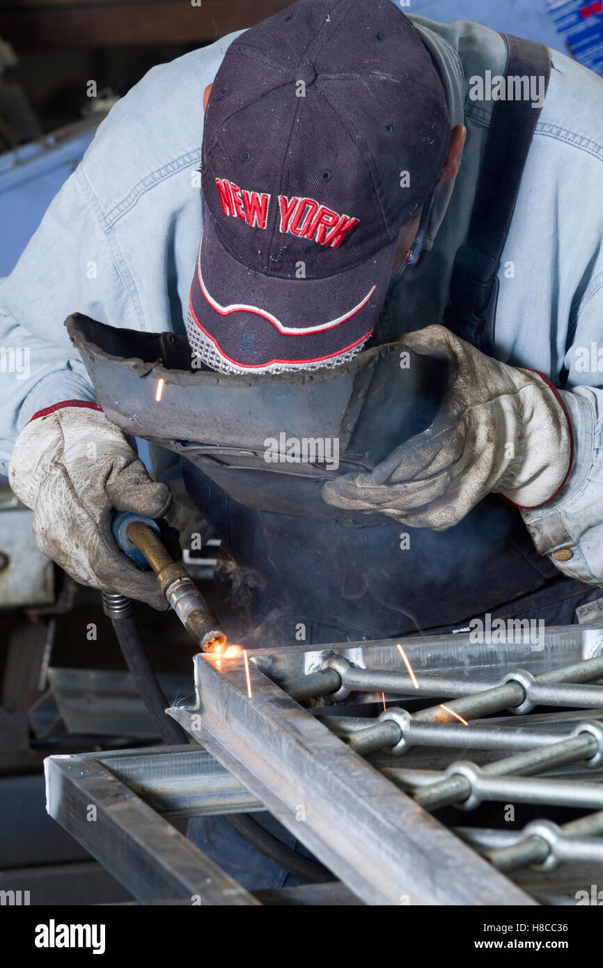 metalworker at work in a workshop Stock Photo - Alamy