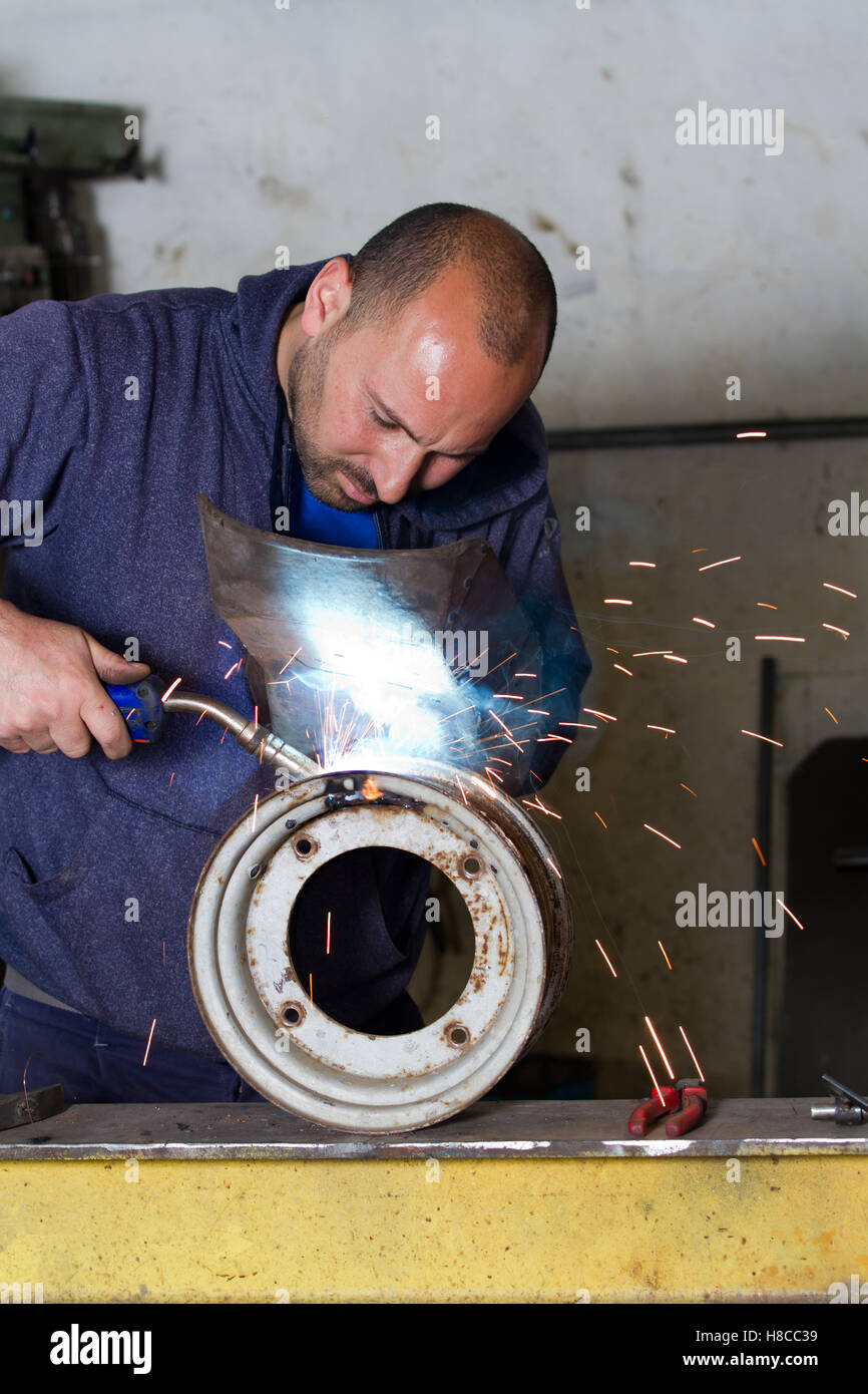 metalworker in his workshop Stock Photo - Alamy