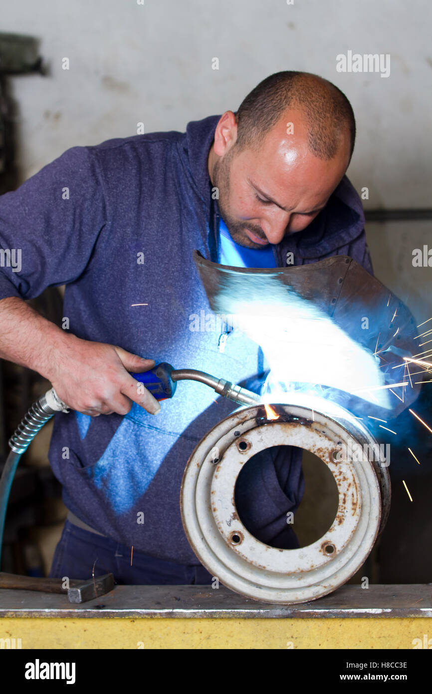 metalworker in his workshop Stock Photo - Alamy