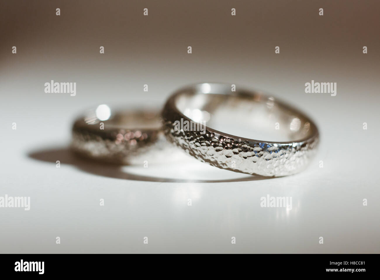 Two nice silver wedding rings Stock Photo - Alamy