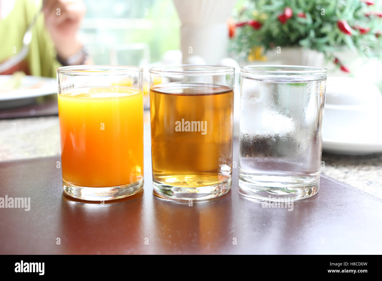 Water glass on dining table in the restaurant Stock Photo - Alamy