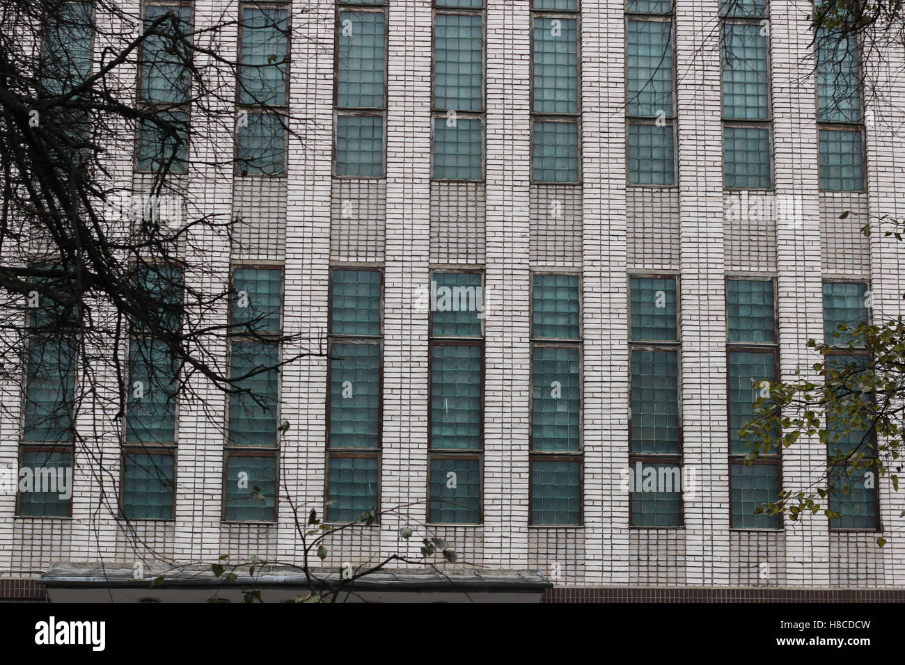 Retro brick building window Stock Photo - Alamy