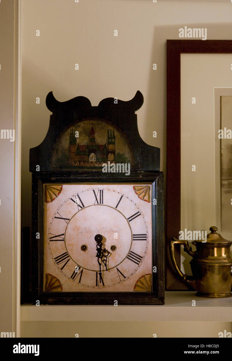 Old fashioned clock on shelf Stock Photo - Alamy