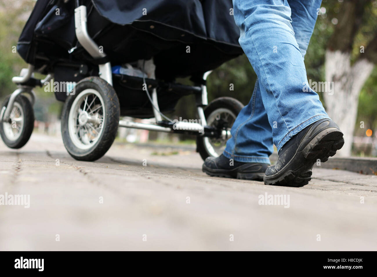 foot steps with stroller Stock Photo - Alamy
