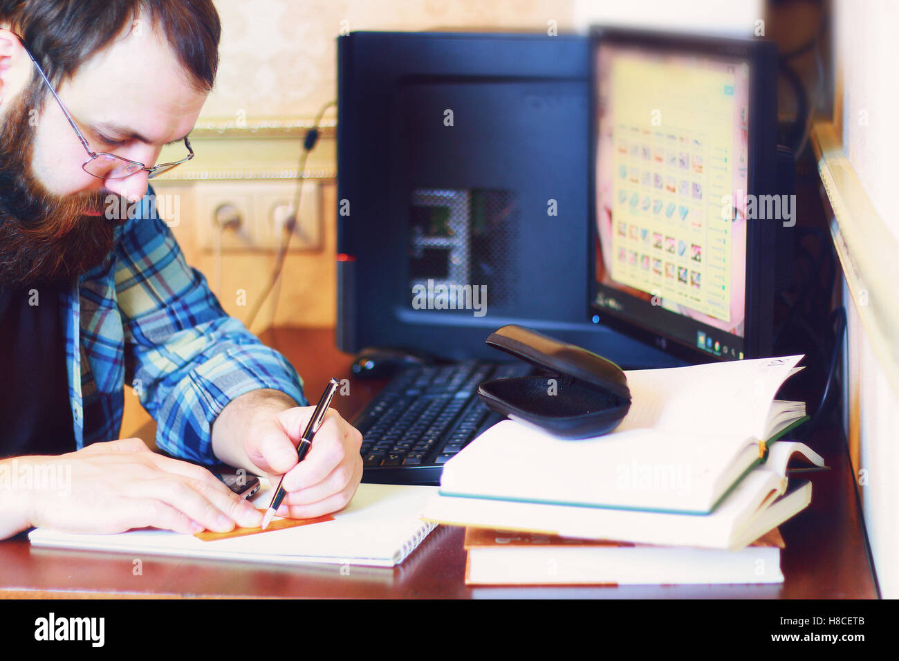 male work computer pen write Stock Photo - Alamy