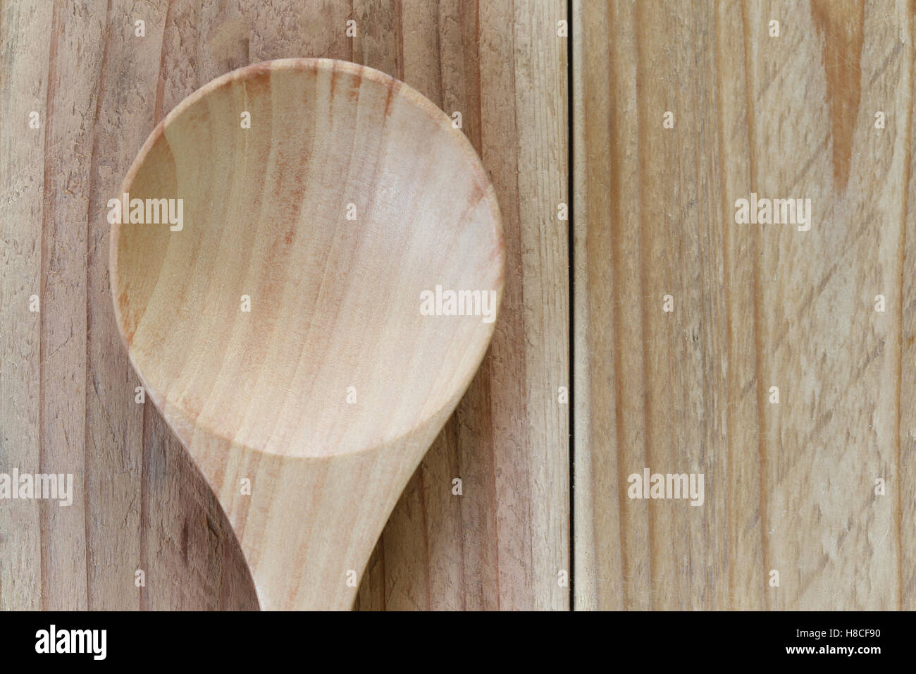 wooden spoon on wood floor for the design food concept background Stock ...