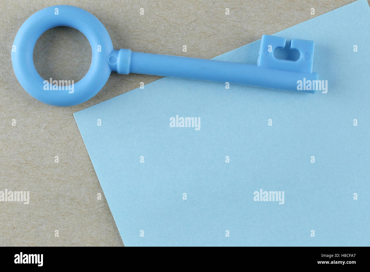 Blue Plastic key is placed on Blue Paper Note and can input text to it ...