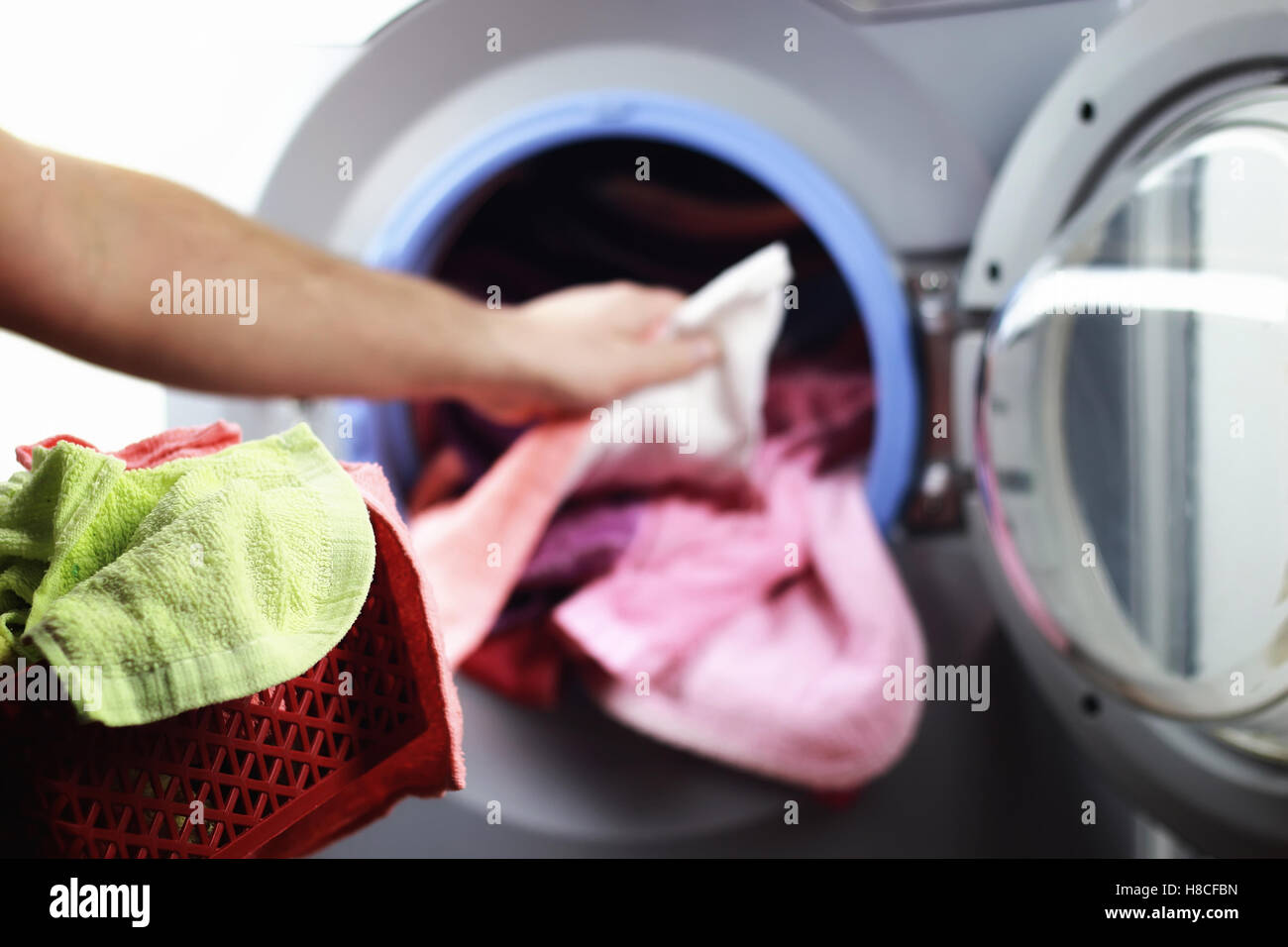 machine Washer hand put Stock Photo - Alamy