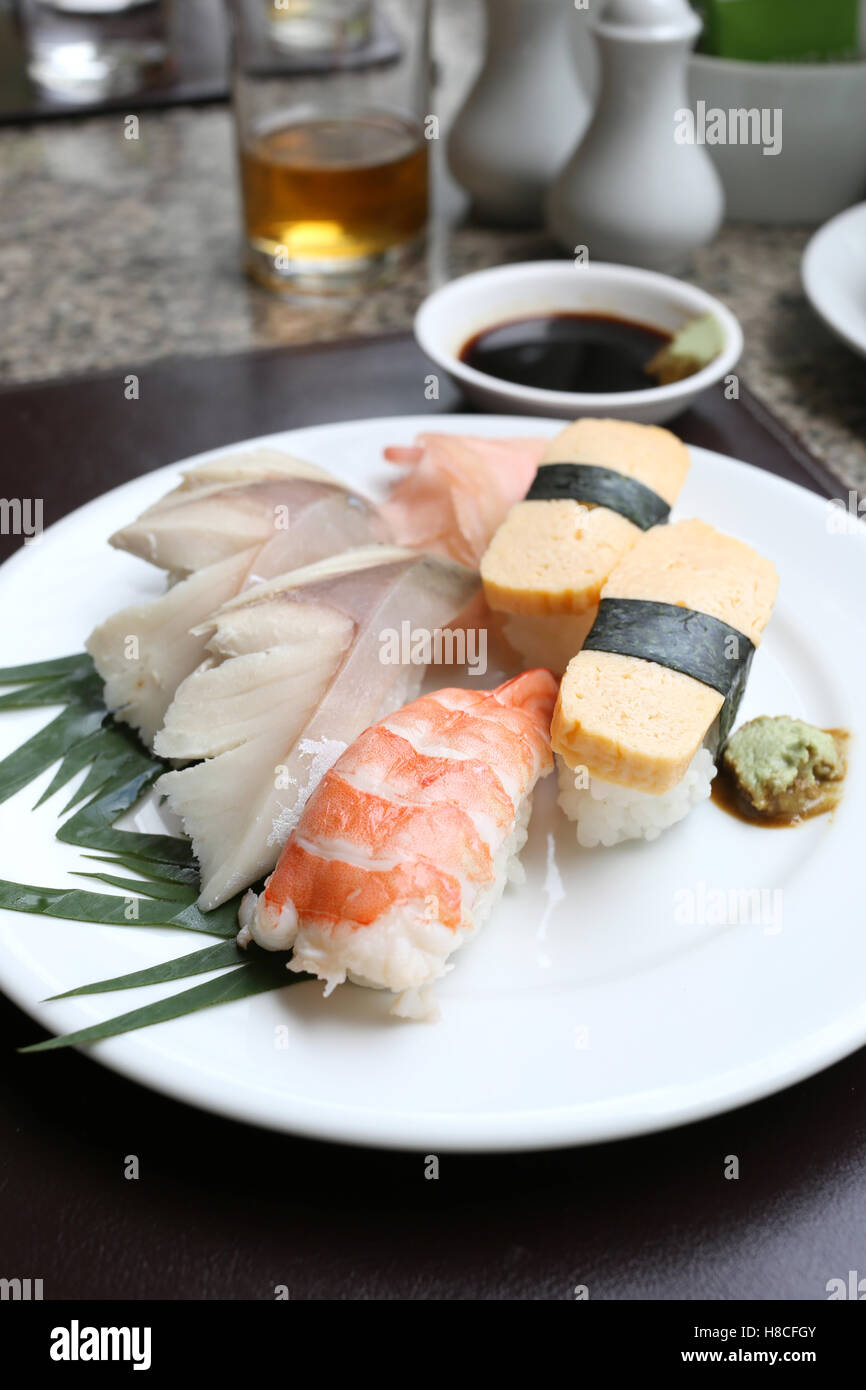 Seafoods Sushi on white dish in the restaurant,Traditional of Japanese ...