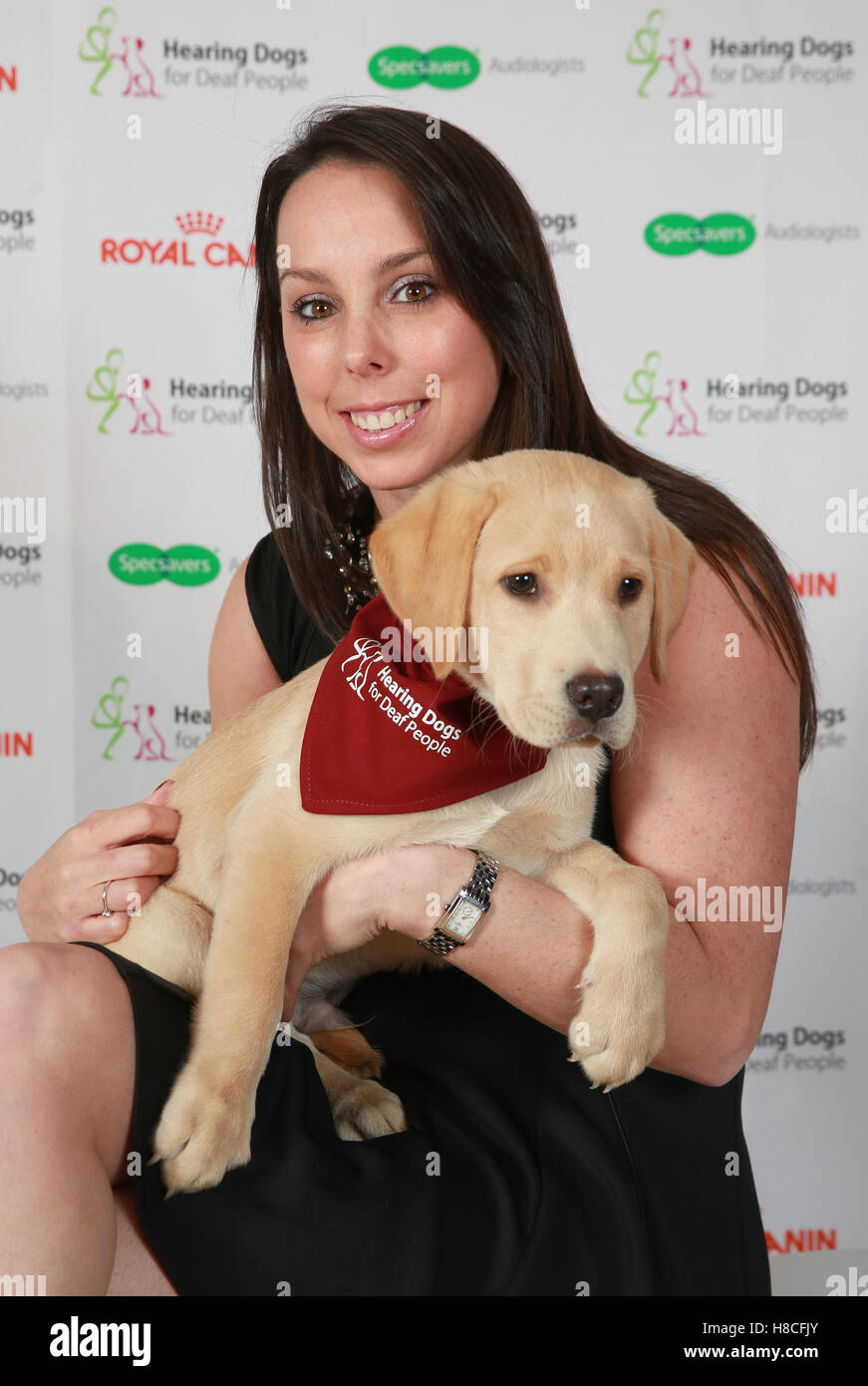 EDITORIAL USE ONLY Beth Tweddle with Kody, a hearing dog puppy, at The ...