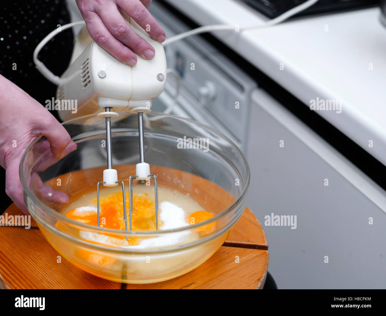 Female hand electric mixer hi-res stock photography and images - Alamy