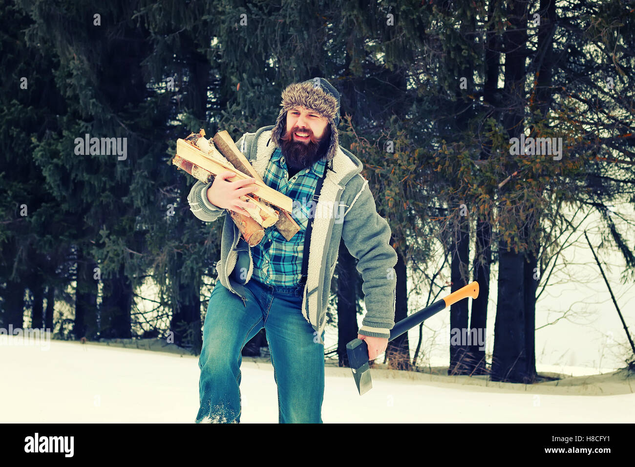 winter man axe wood Stock Photo - Alamy