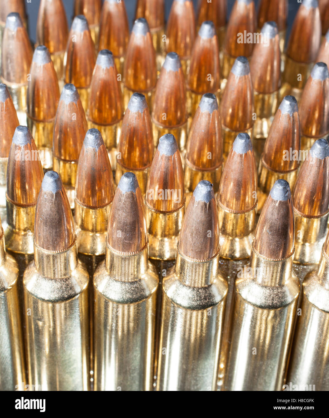 Tall bullets that go into a high powered rifle Stock Photo - Alamy