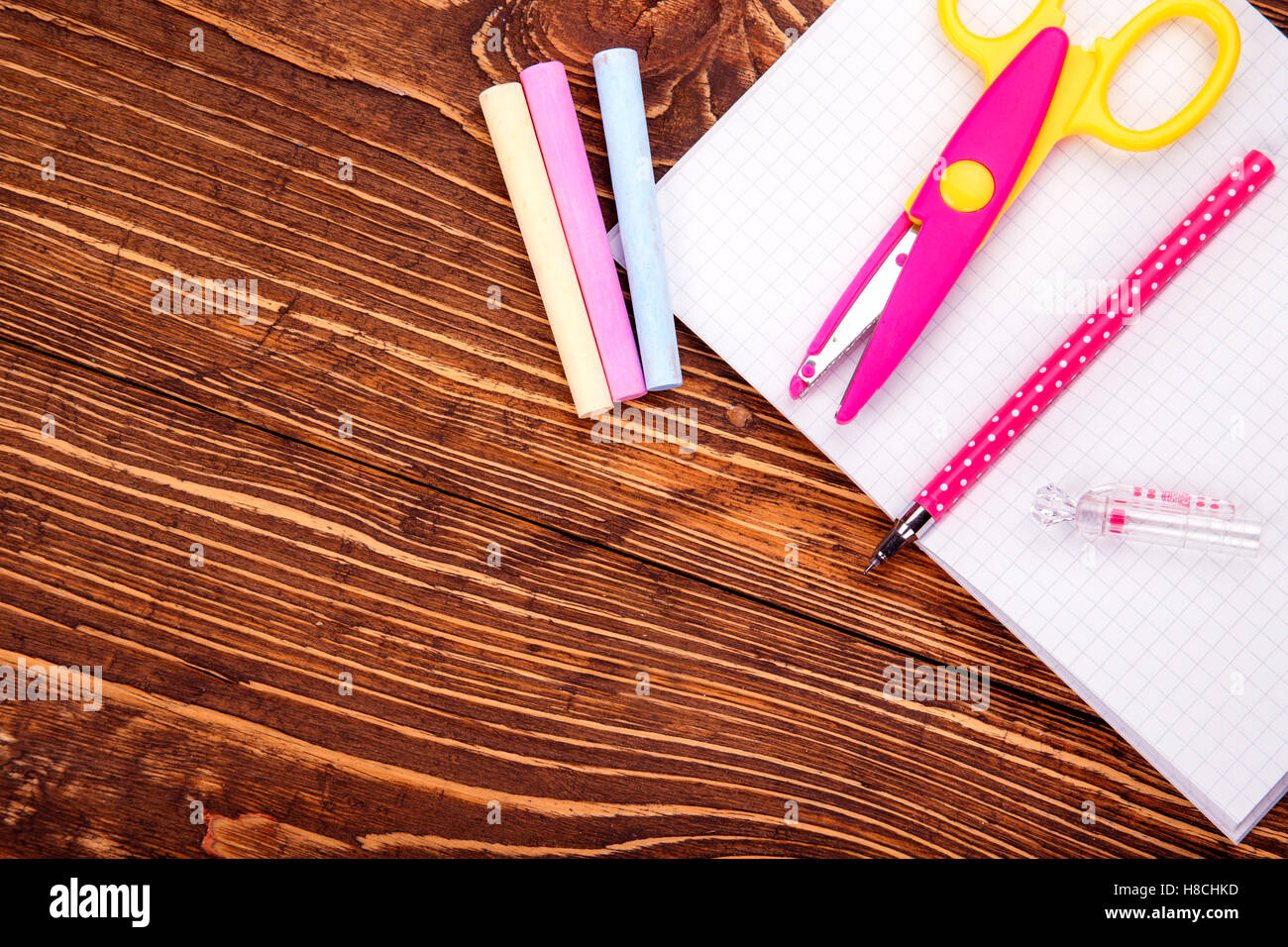 retro wooden table with school supplies on it Back to school concept ...