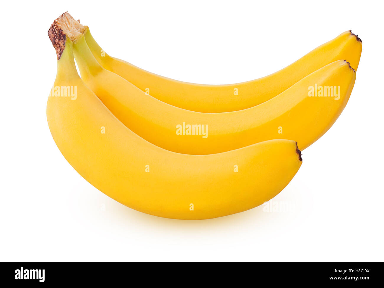 Three bananas isolated on white background Stock Photo - Alamy