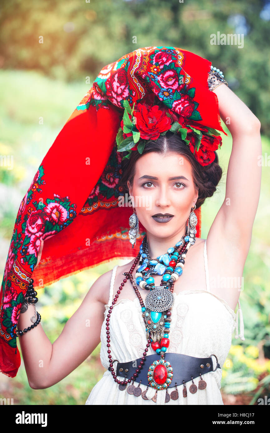 Beautiful young Mexican woman Posing. He looks in the frame Stock Photo ...