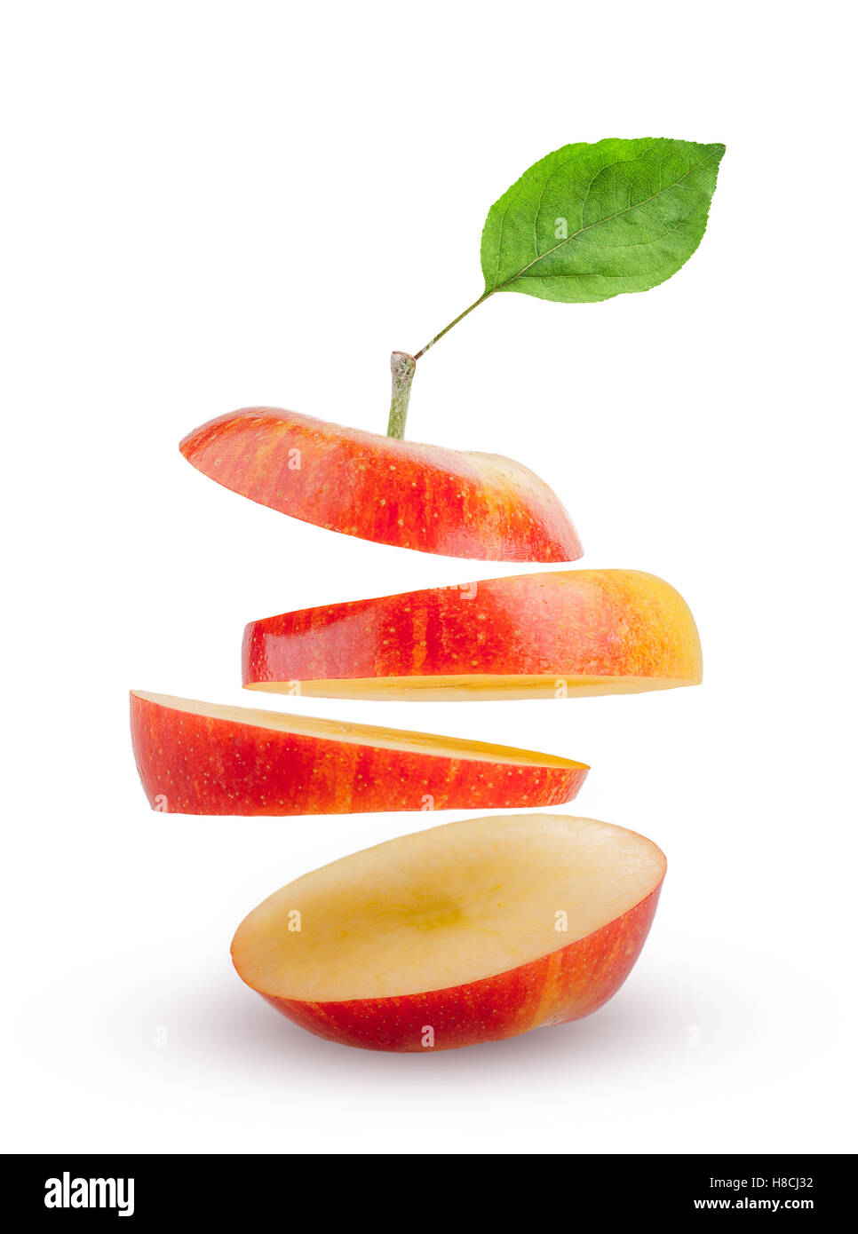 apple slices flying in the air isolated on white background Stock Photo ...