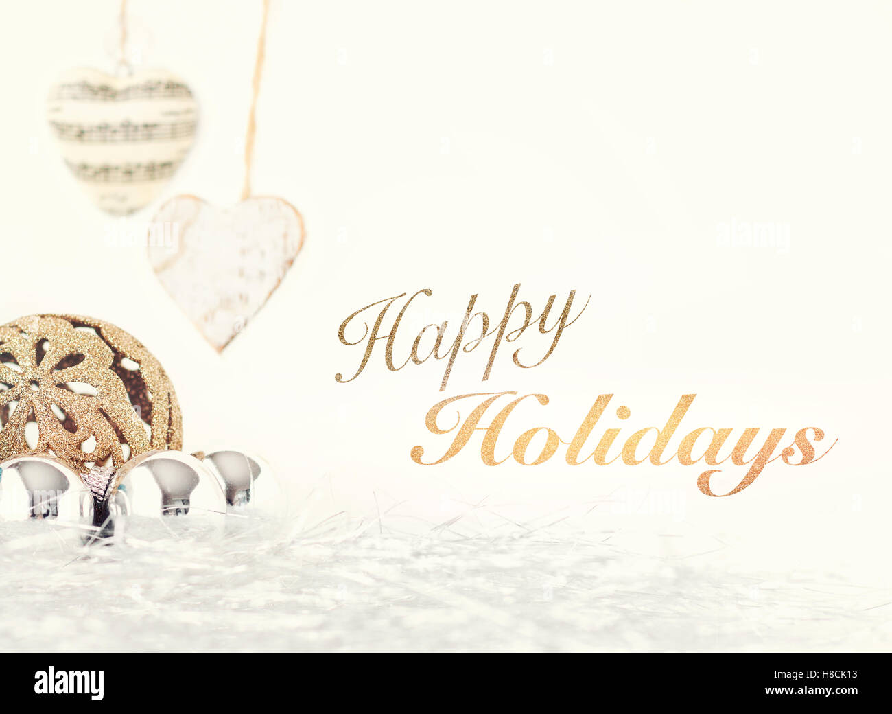 Happy holidays text in gold hi-res stock photography and images - Alamy