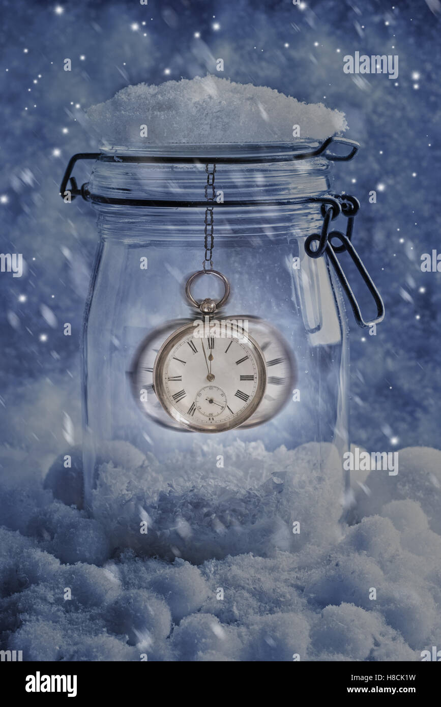 Midnight pocket watch in snow setting Stock Photo - Alamy