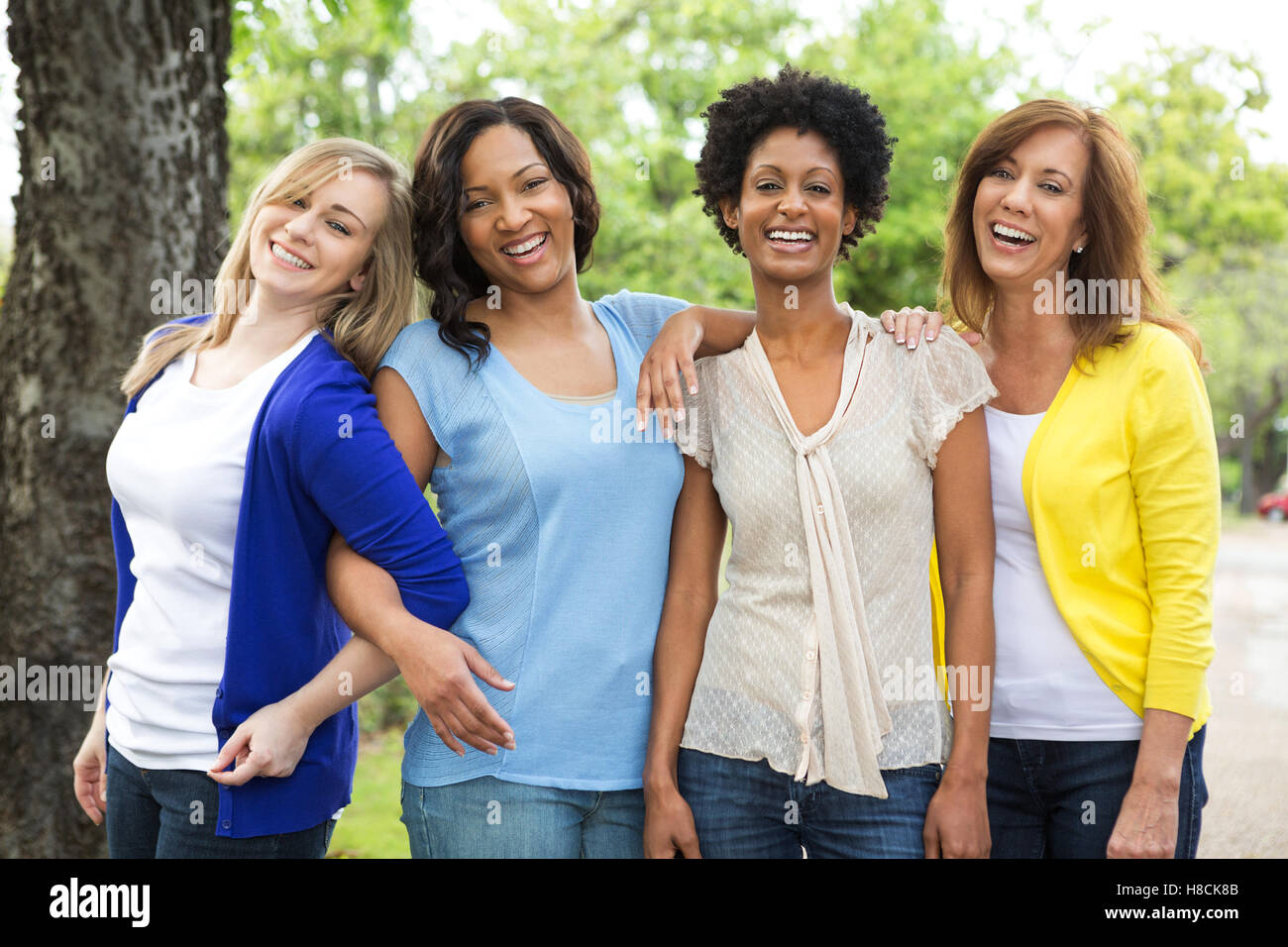 Multicultural group friends laughing smiling hi-res stock photography ...
