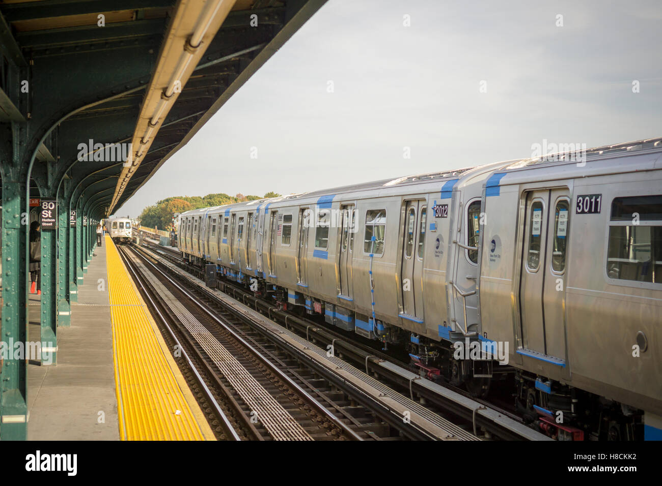 A test train, right, consisting of new R179 subway cars runs along the ...