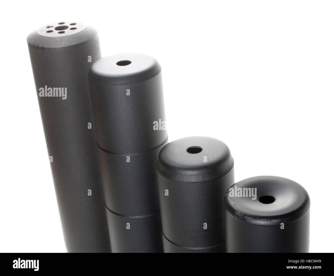 Four suppressors in a row with a white background Stock Photo - Alamy