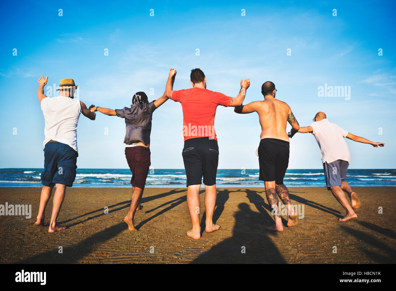 Company group running hi-res stock photography and images - Alamy
