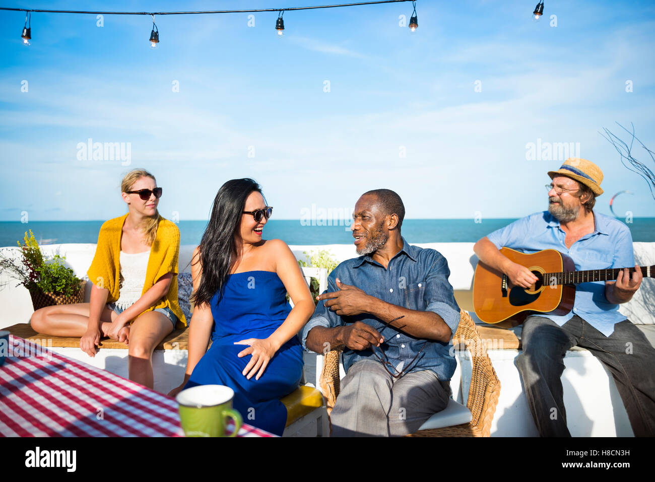 Group people playing musical instrument hi-res stock photography and ...