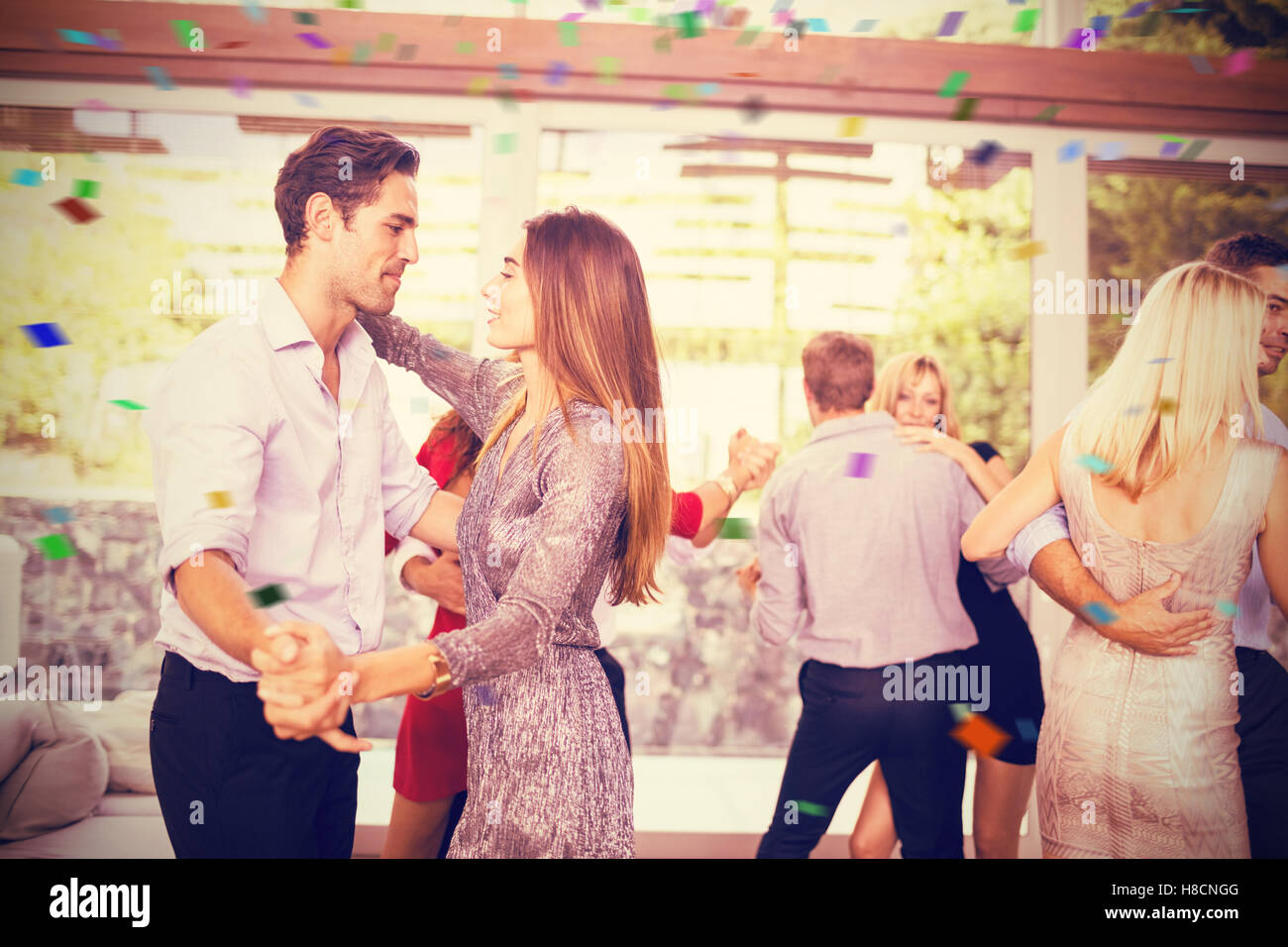 Friends dancing swimming pool party hi-res stock photography and images ...
