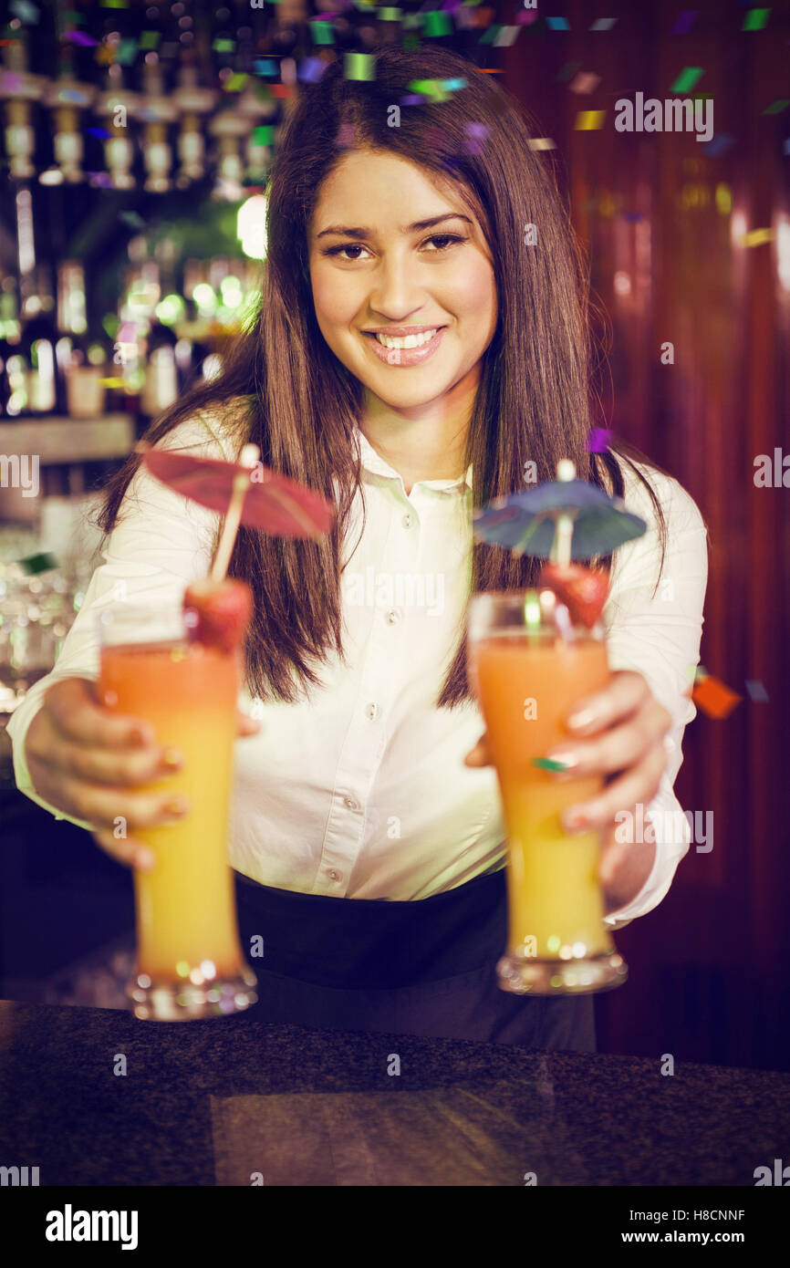 Bartender serving woman cocktail bar hi-res stock photography and images - Alamy